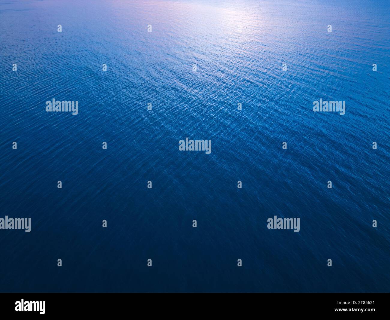 Aerial view of the sea surface reflecting the sky Stock Photo - Alamy