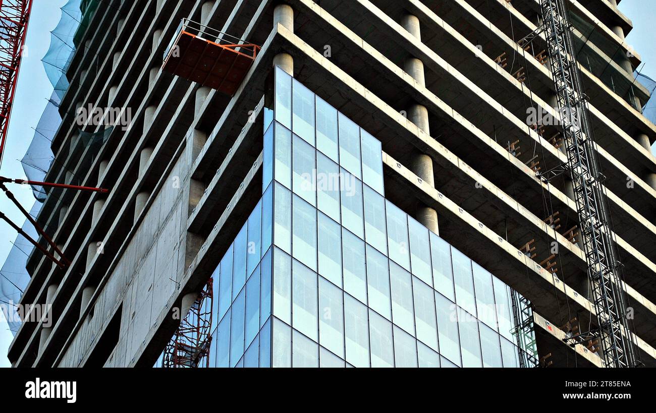 View of a skyscraper under construction. Modern architecture background ...