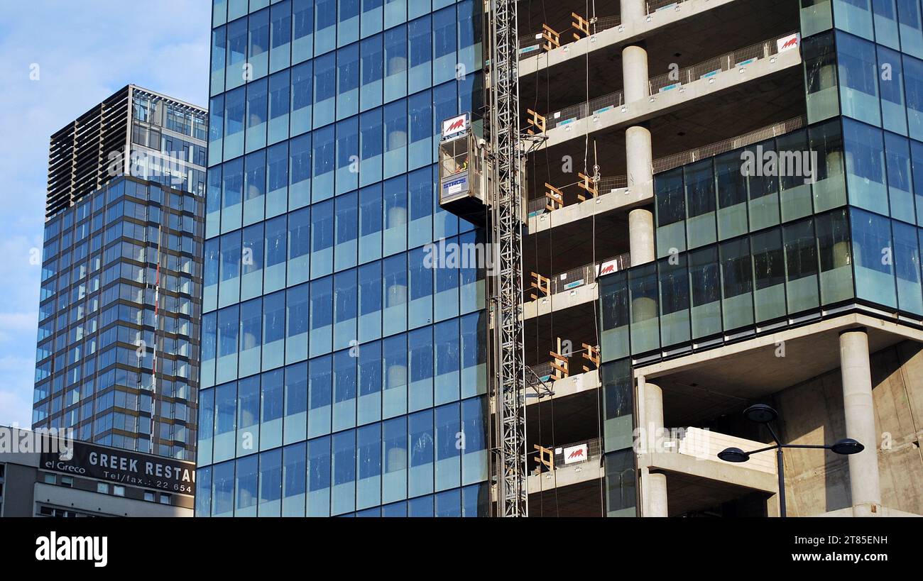 View of a skyscraper under construction. Modern architecture background ...