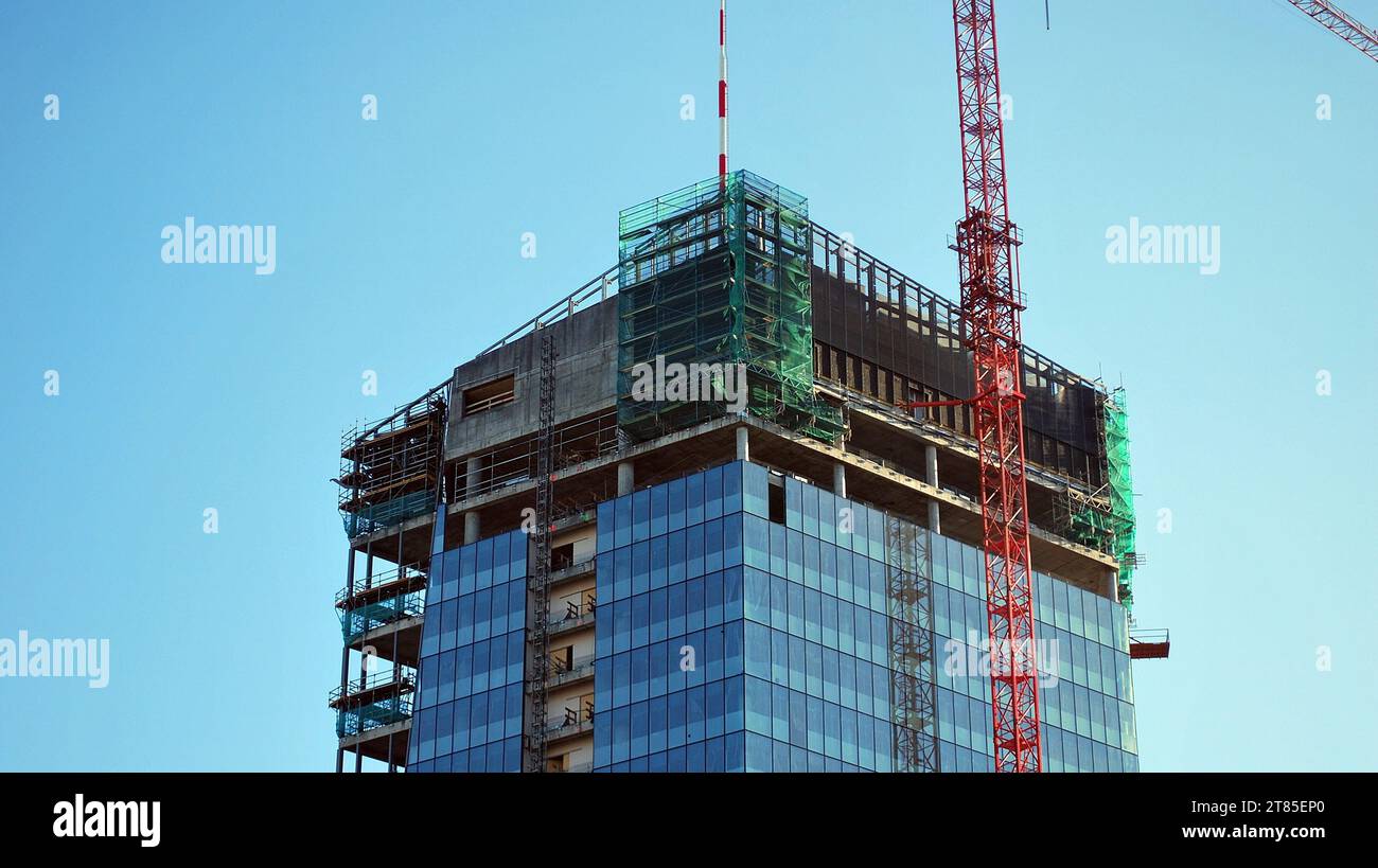 View of a skyscraper under construction. Modern architecture background ...