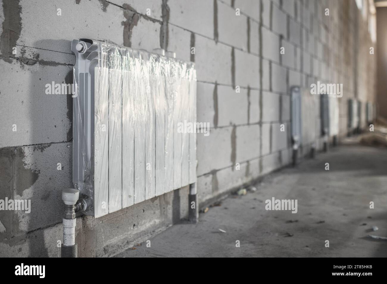 Installed heating radiators in rough finish during building ...