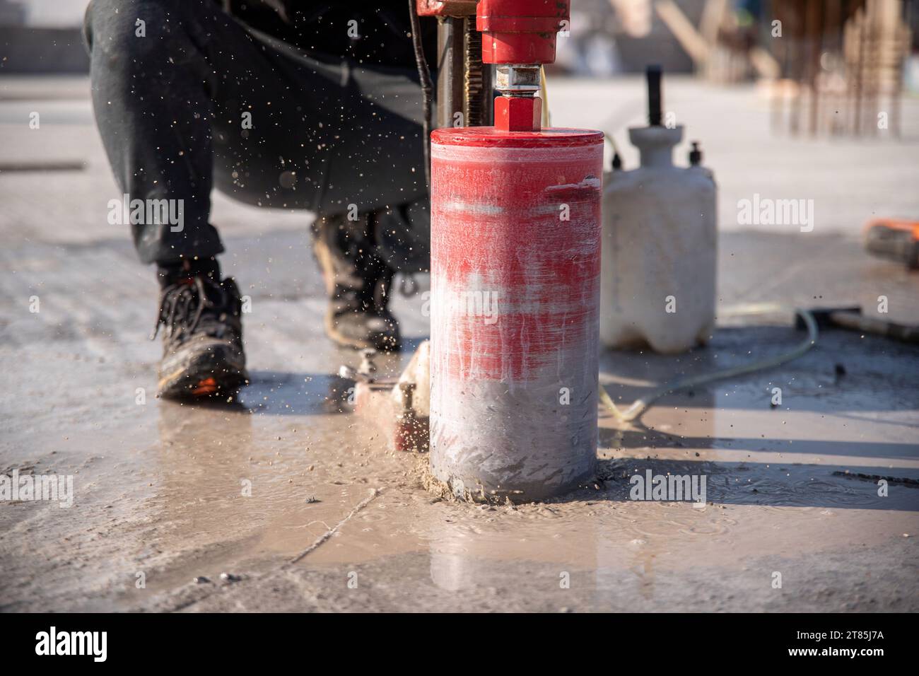 Drilling concrete using a diamond bit drilling rig Stock Photo - Alamy