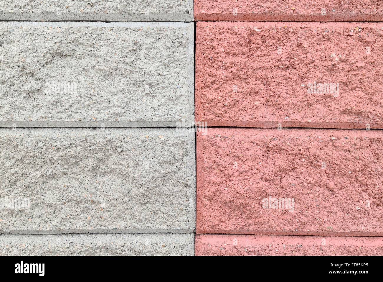 Red and gray concrete bricks on outdoor fence, background Stock Photo ...