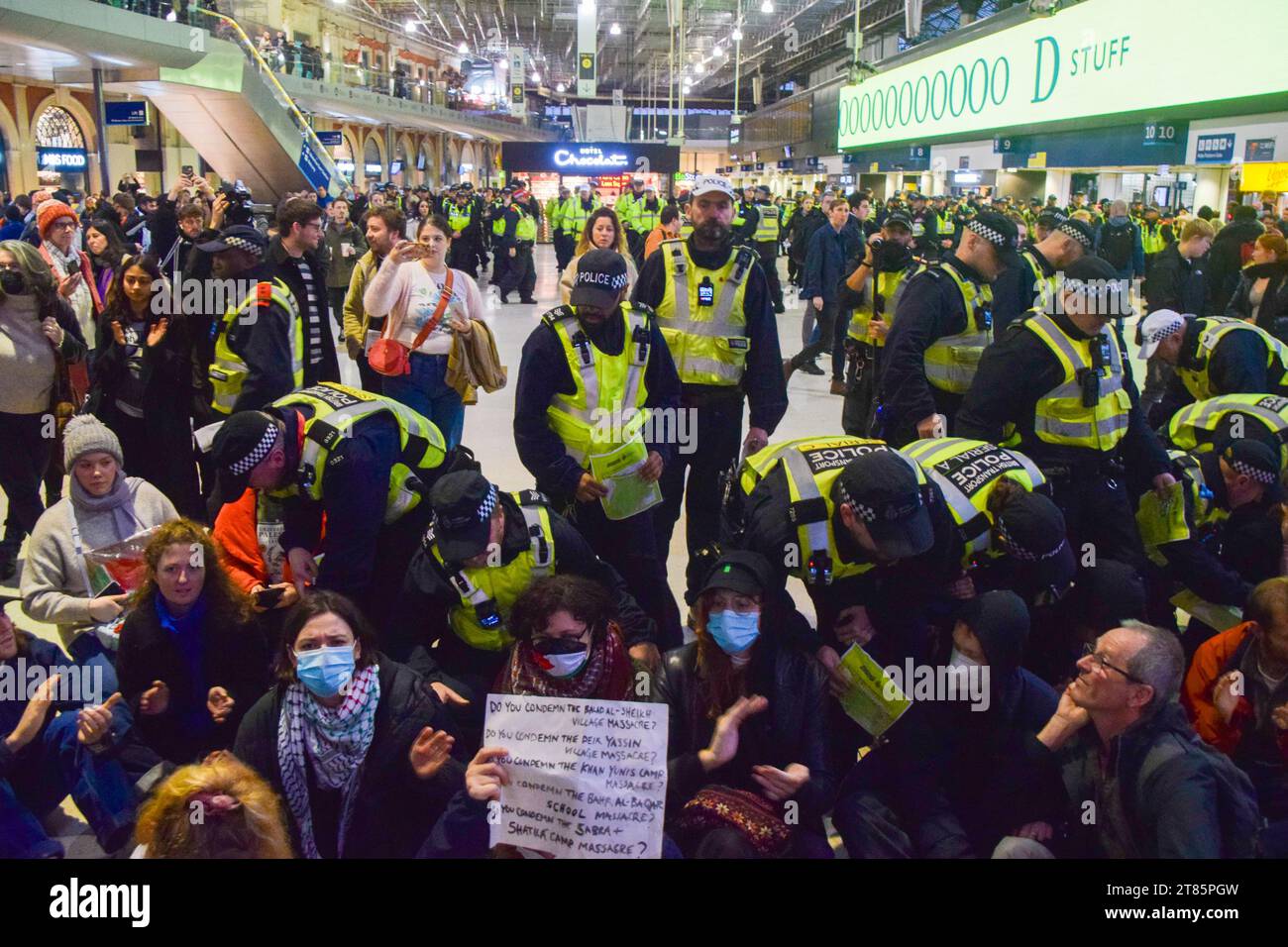 London, UK. 18th November 2023. Police officers issue a prohibition ...