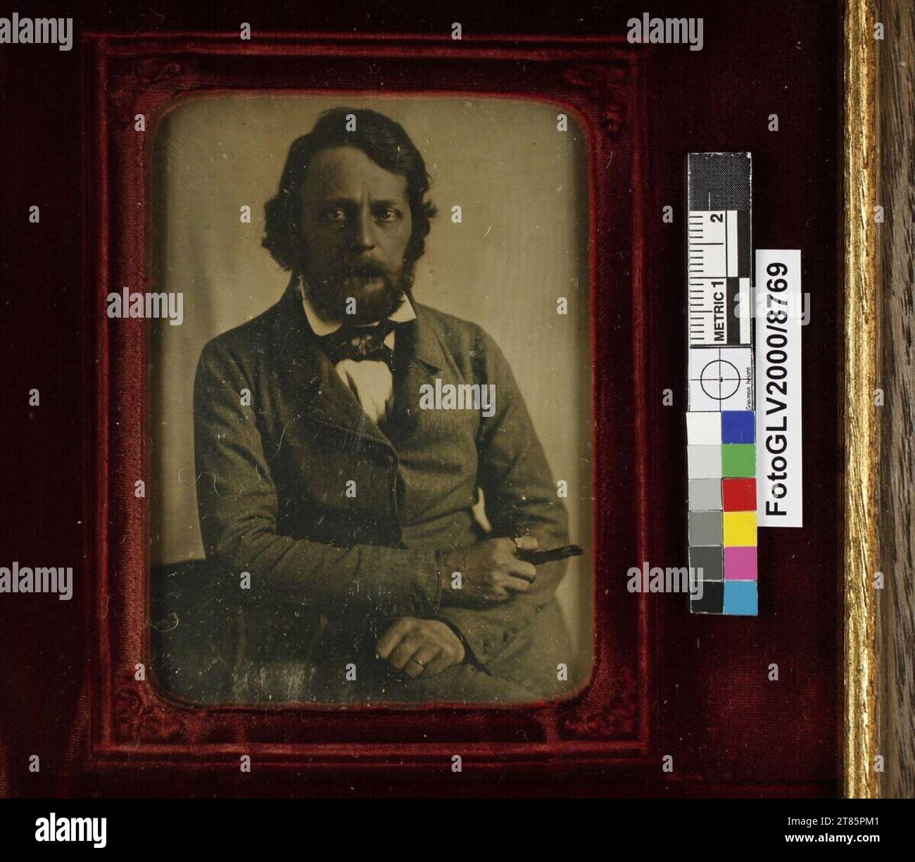 Anonym Portrait of a bearded gentleman, half figure, with a cigar ...