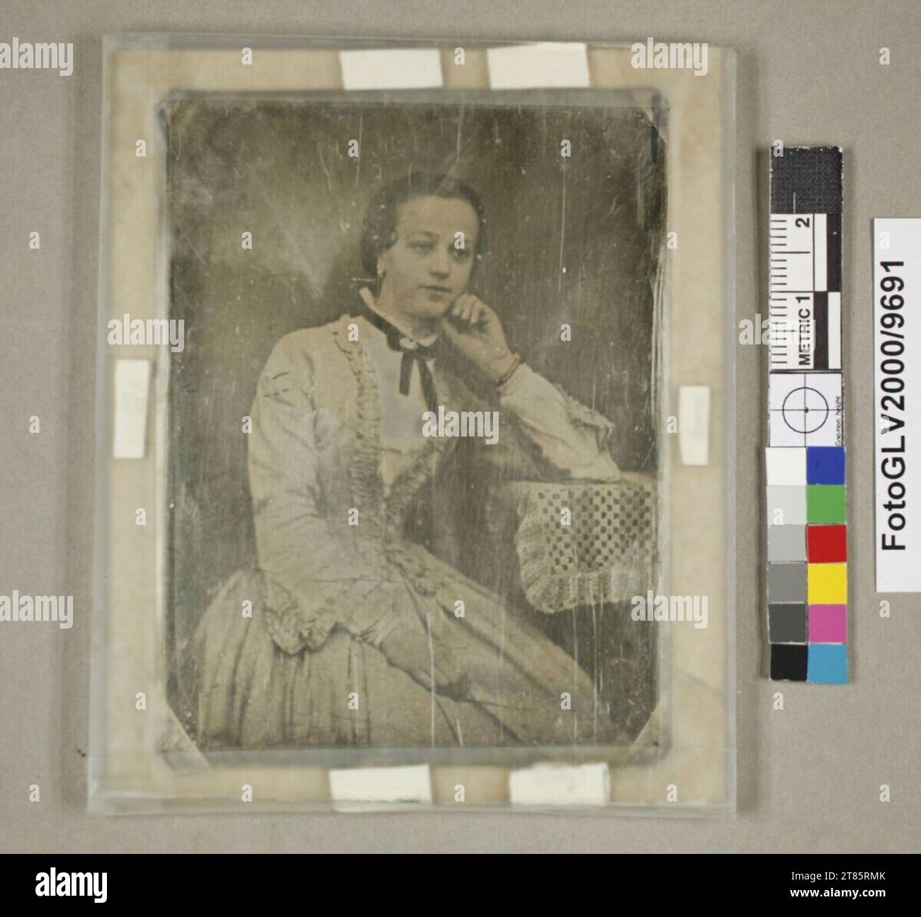 Albin Mutterer Young lady, three -quarter figure, sitting at a table ...