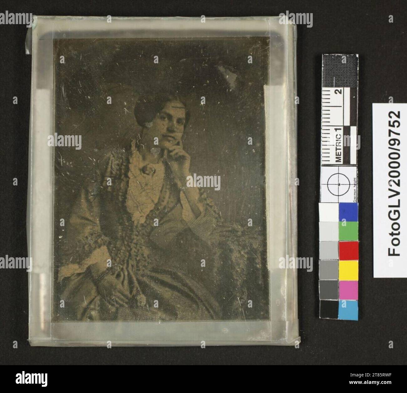 Anonym Portrait of a lady, three -quarter figure, sitting at a table ...