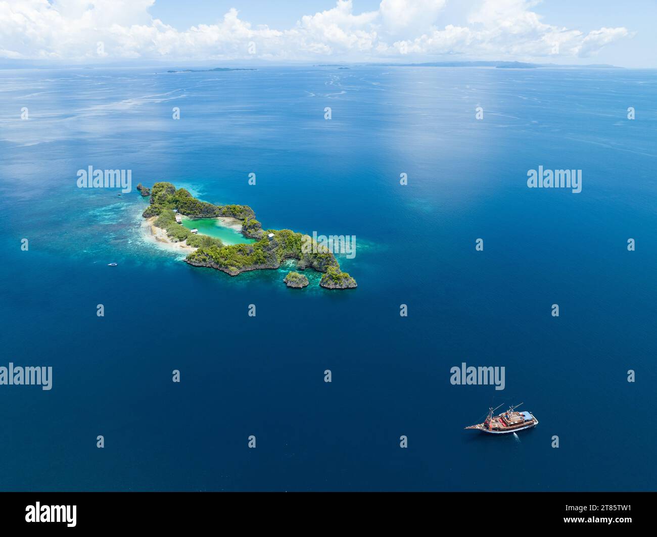 Idyllic Rufas Island, near Penemu in Raja Ampat, is surrounded by ...