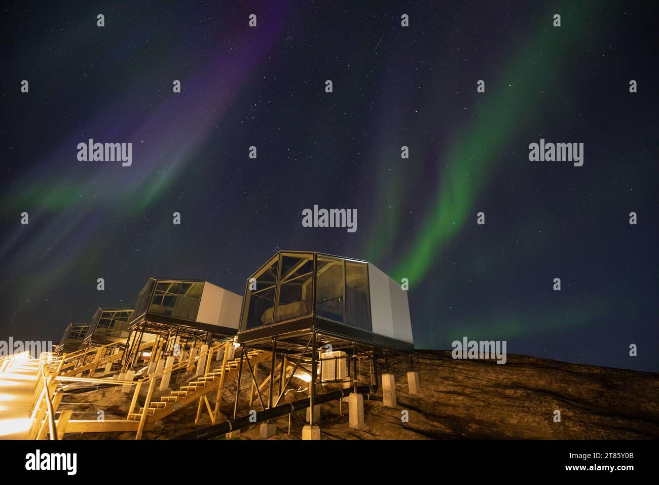 Northern Lights in Ilulissat. Arctic Greenland. Picturesque village on ...
