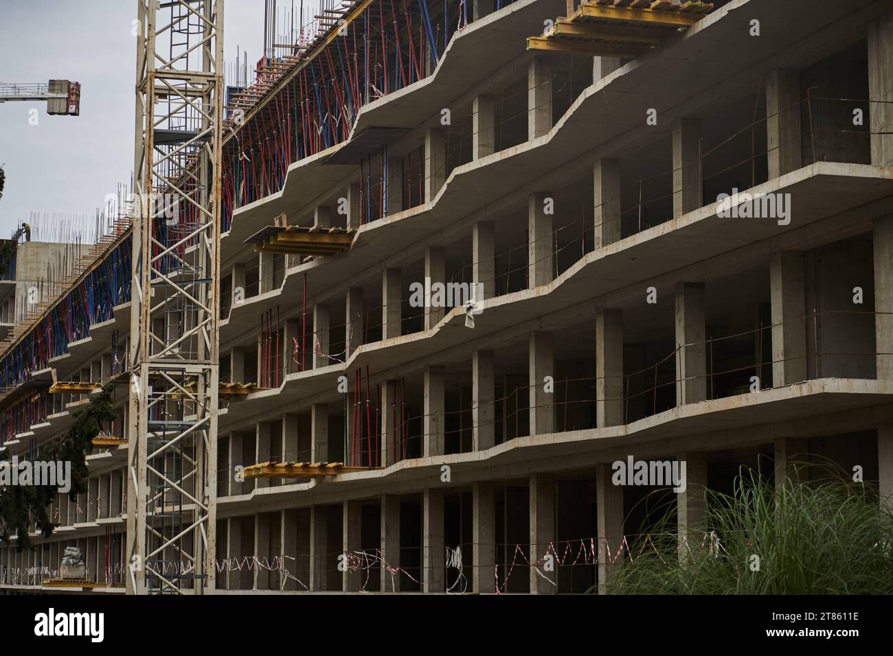 The process of construction works using construction cranes. The ...