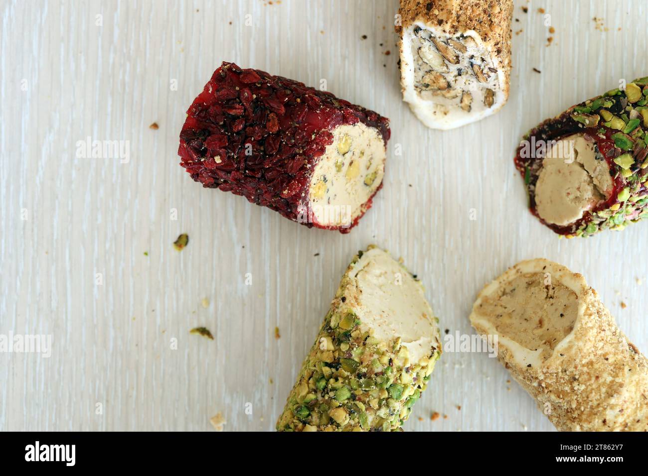 Rolls of turkish delight with different flavors and fillings close up ...