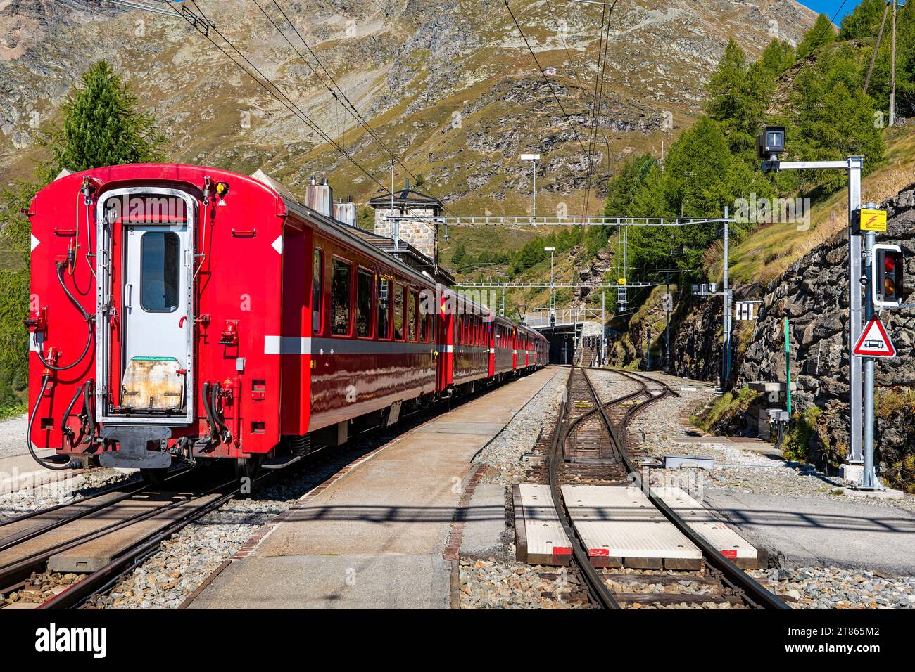 Red train of Bernina in the Swiss alps Stock Photo - Alamy