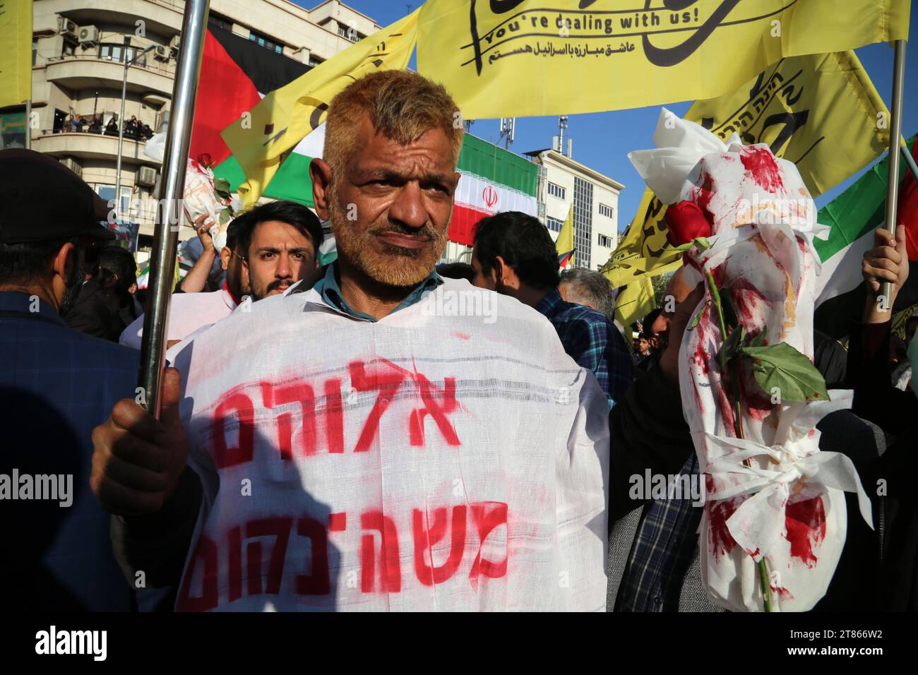 Tehran, Iran. 18th Nov, 2023. An Iranian man wearing a shroud during an ...