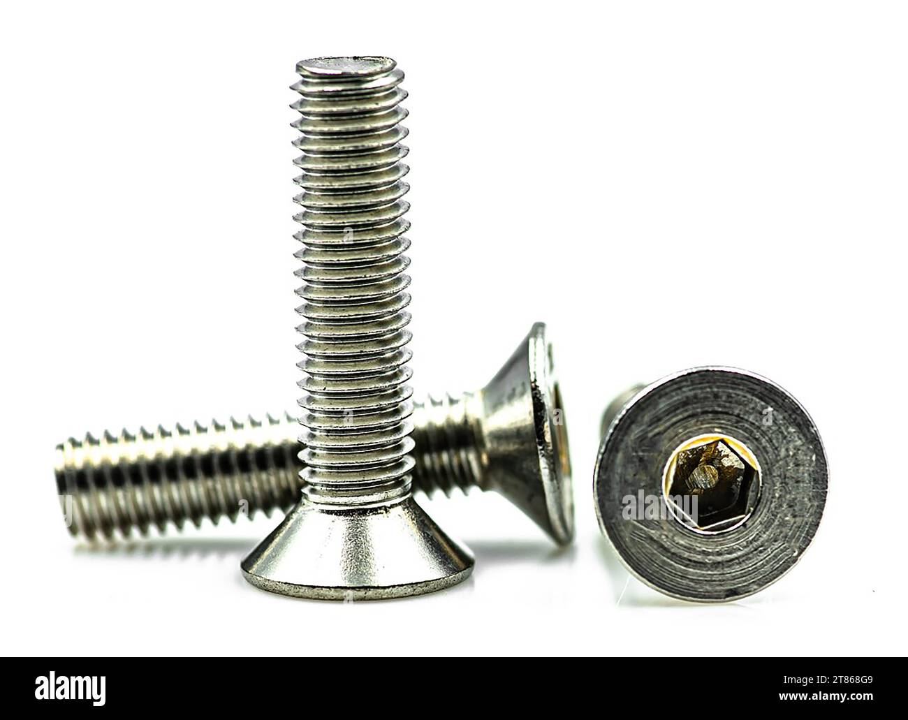 DIN 7991 bolt stainless steel close up white background Stock Photo - Alamy