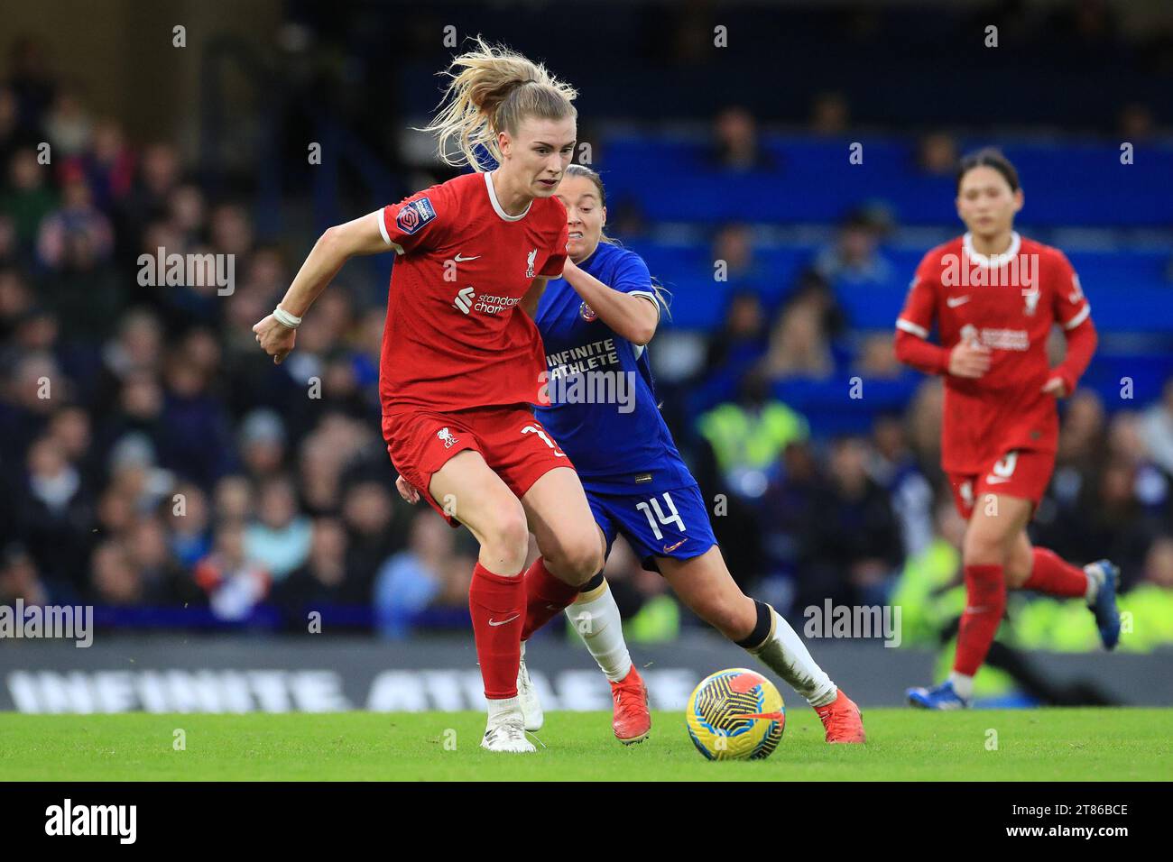 Kingston, UK. 18th Nov, 2023. Jenna Clark of Liverpool Women fends off ...