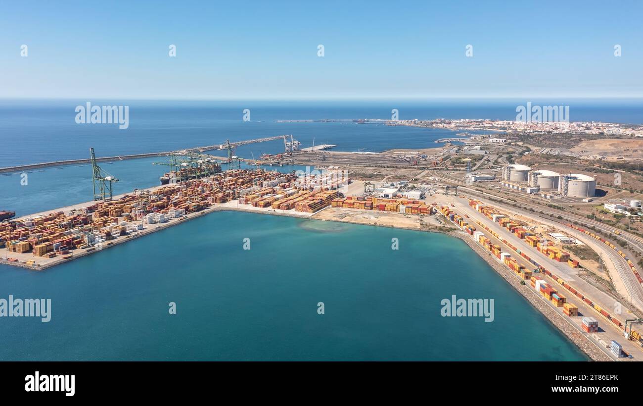 Aerial view of container cargo terminal of commercial port, business ...