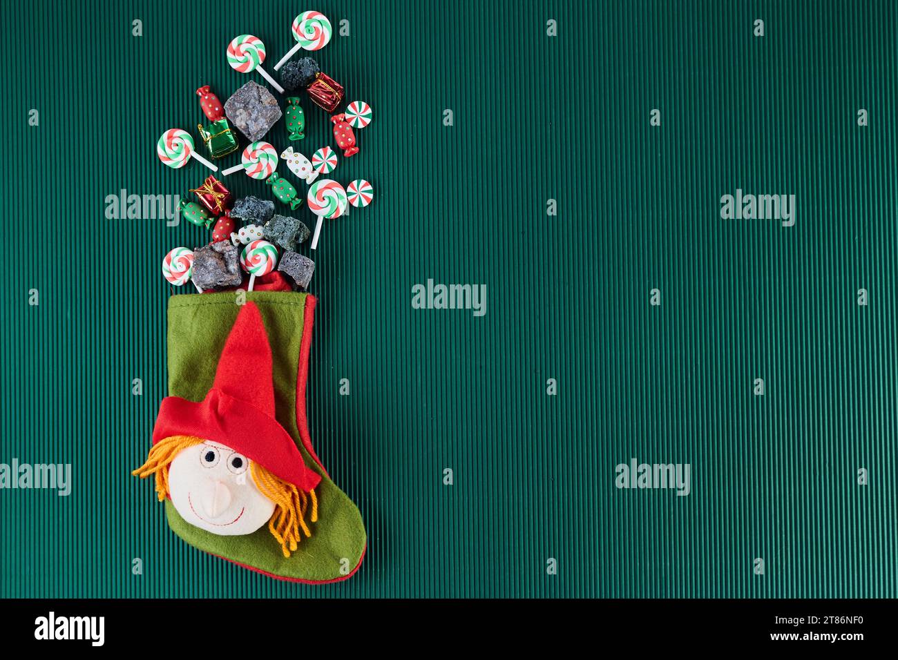 The Befana with sweet coal and candy. Italian Epiphany day tradition ...