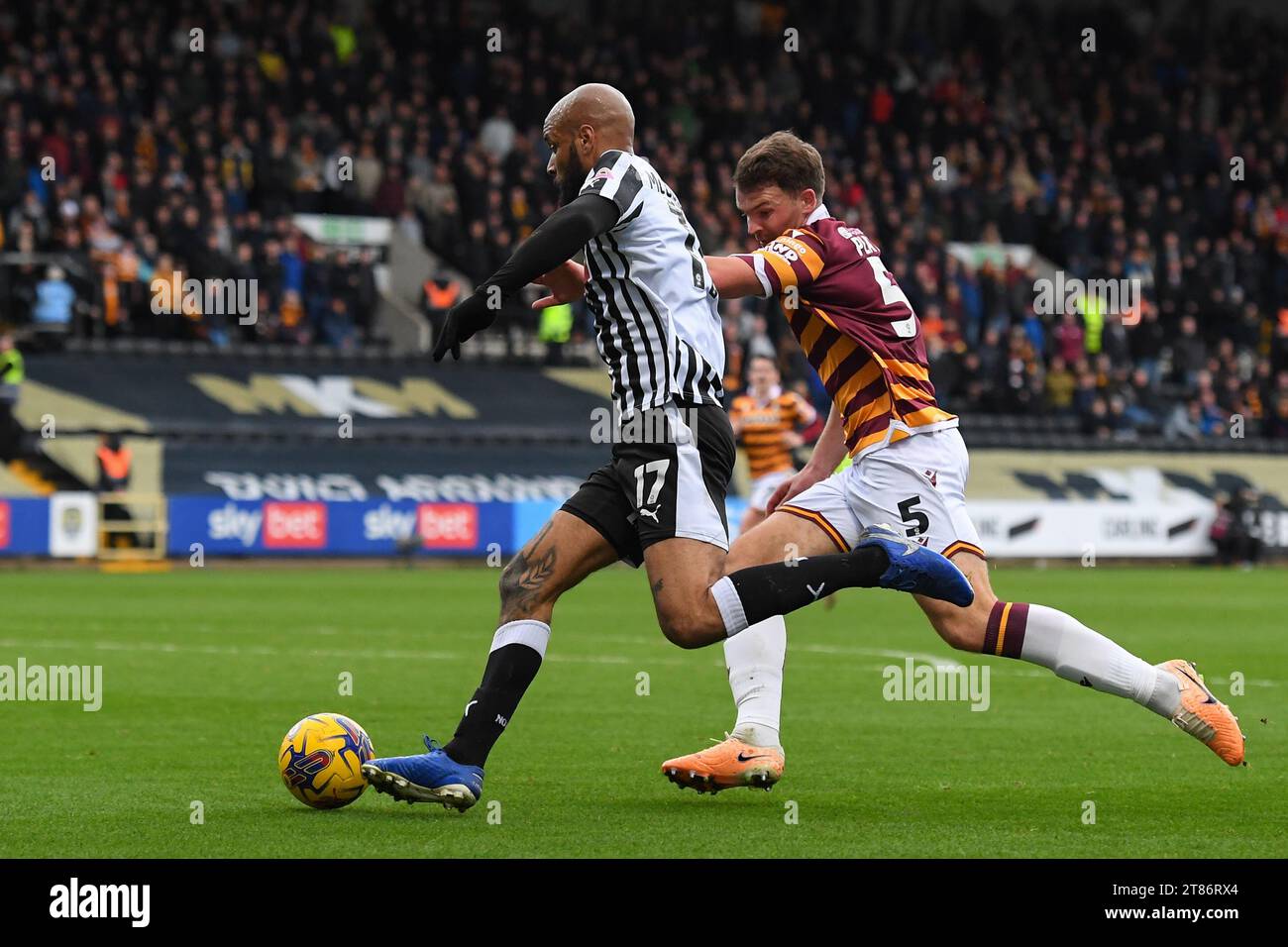 David McGoldrick of Notts County in action under pressure from Matthew ...