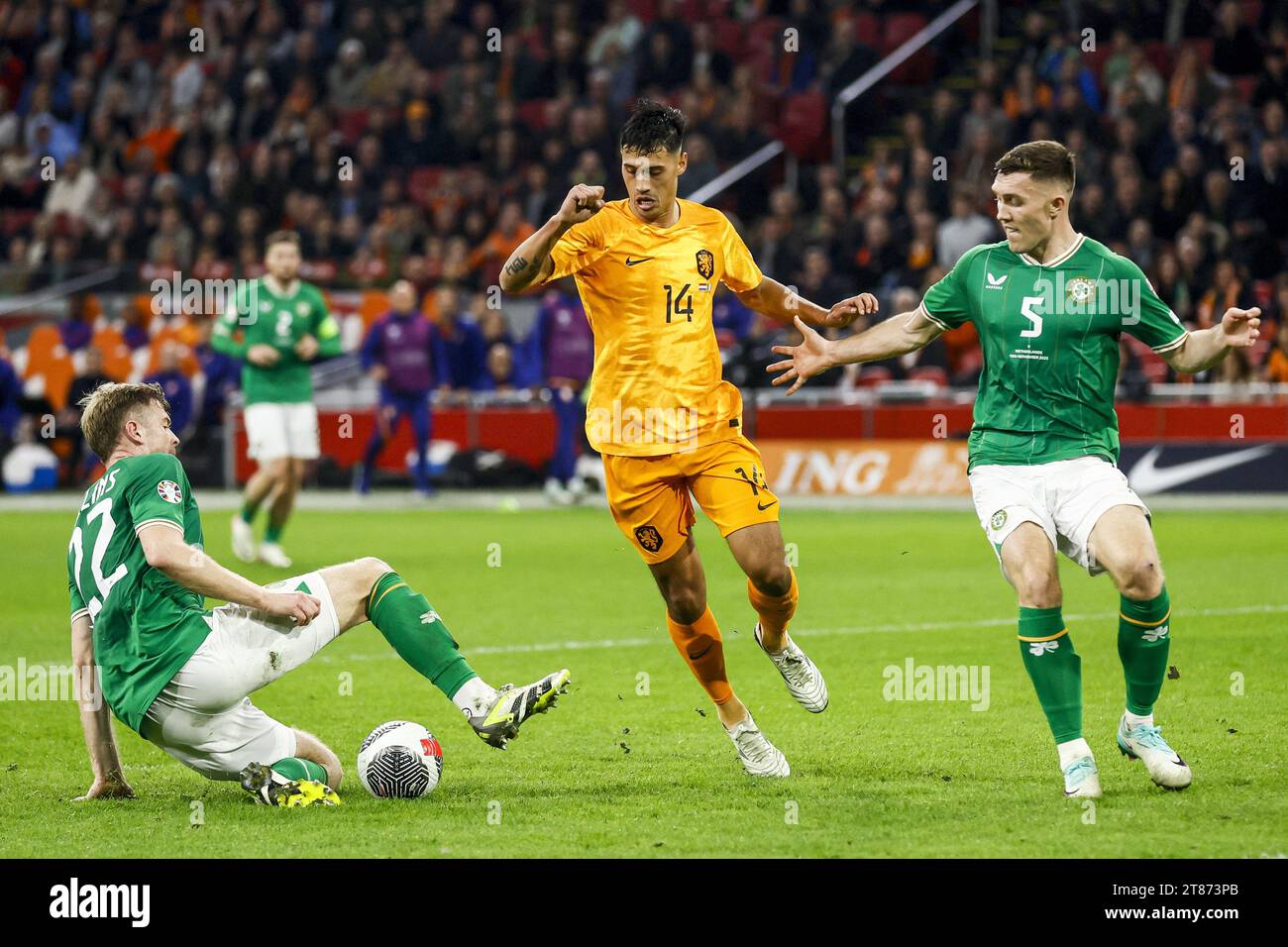 AMSTERDAM - (l-r) Nathan Collins of Ireland, Tijjani Reijnders of ...