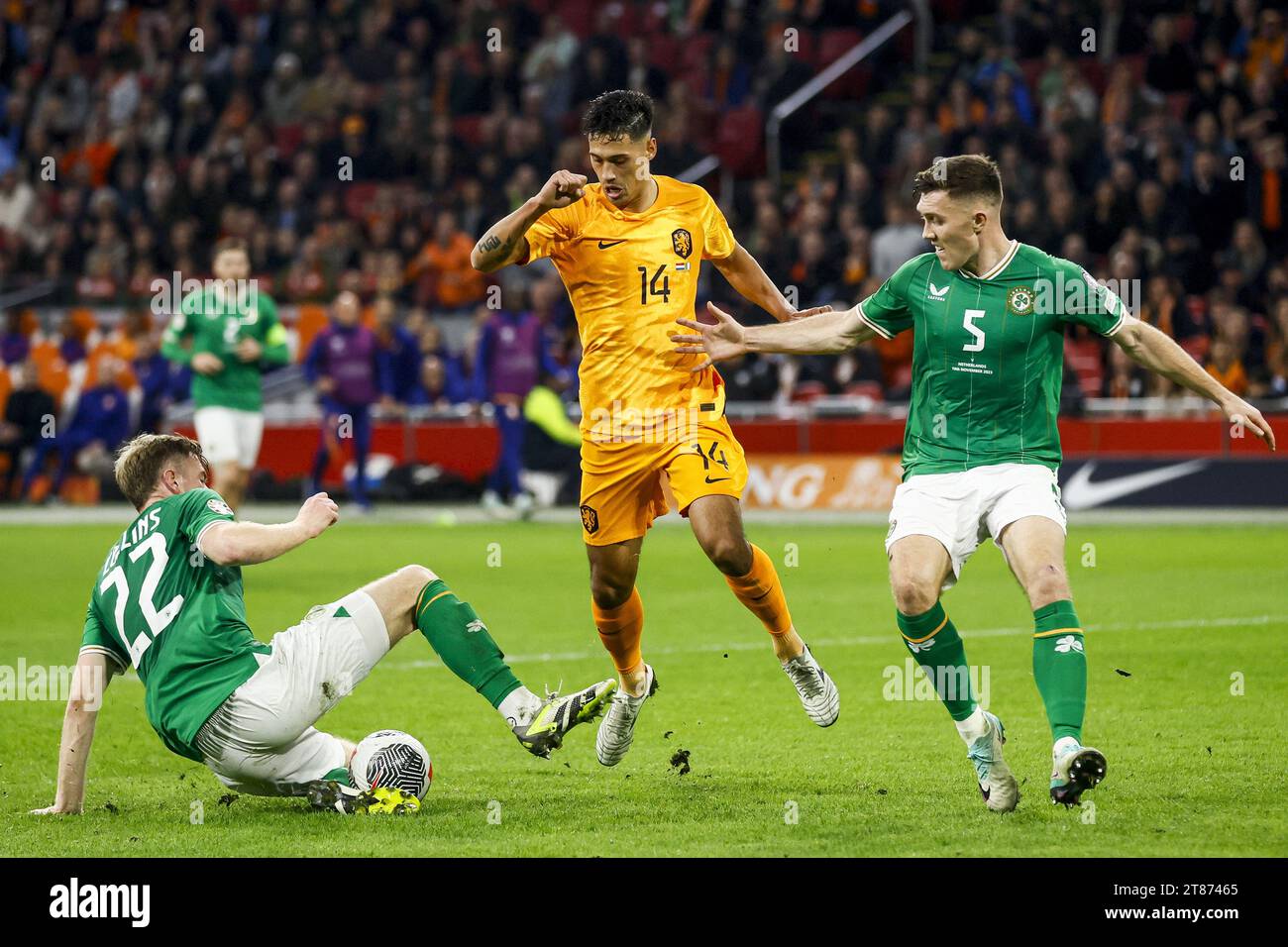 AMSTERDAM - (l-r) Nathan Collins of Ireland, Tijjani Reijnders of ...