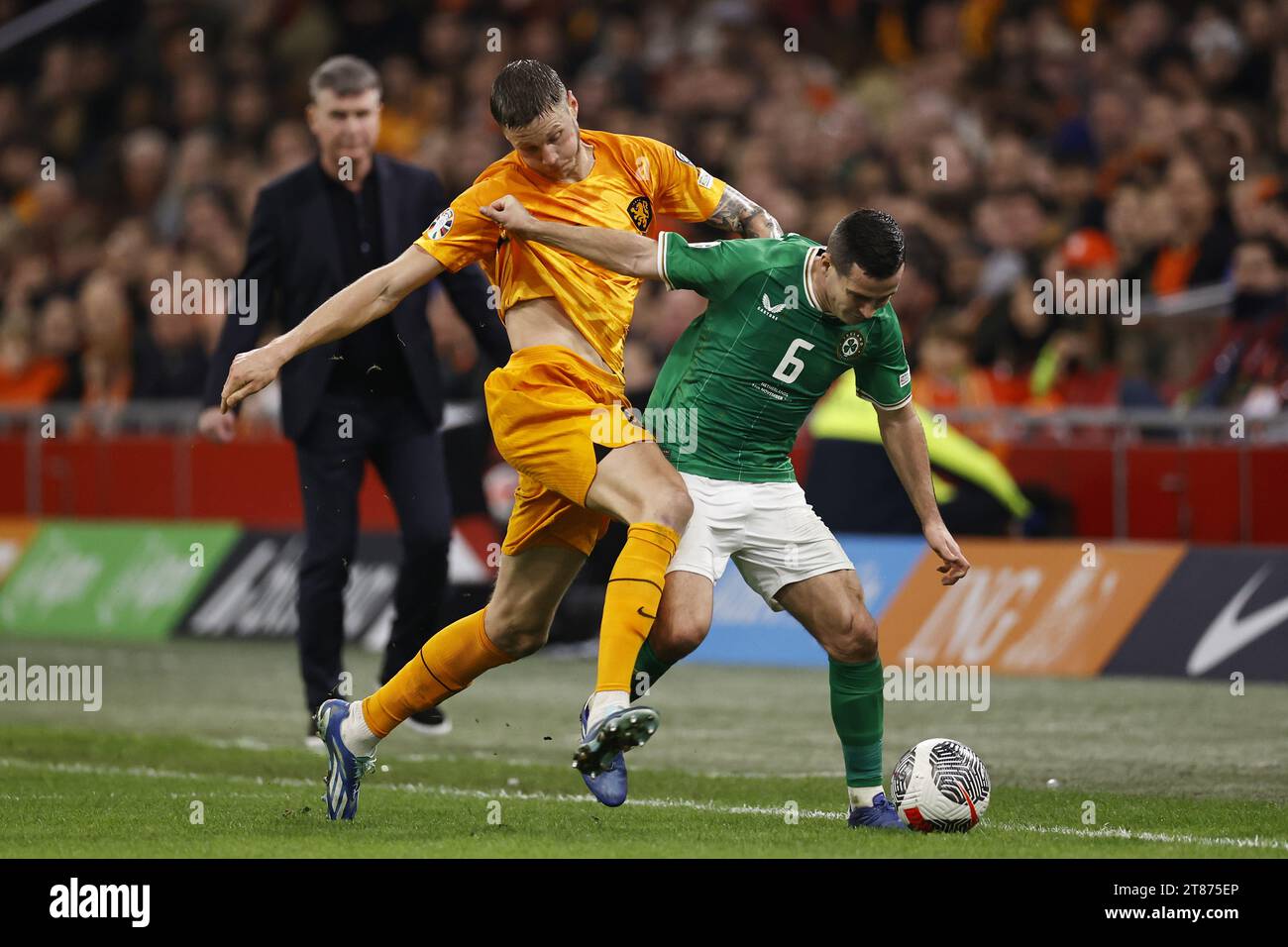 AMSTERDAM - (l-r) Wout Weghorst of Holland, Josh Cullen of Ireland ...