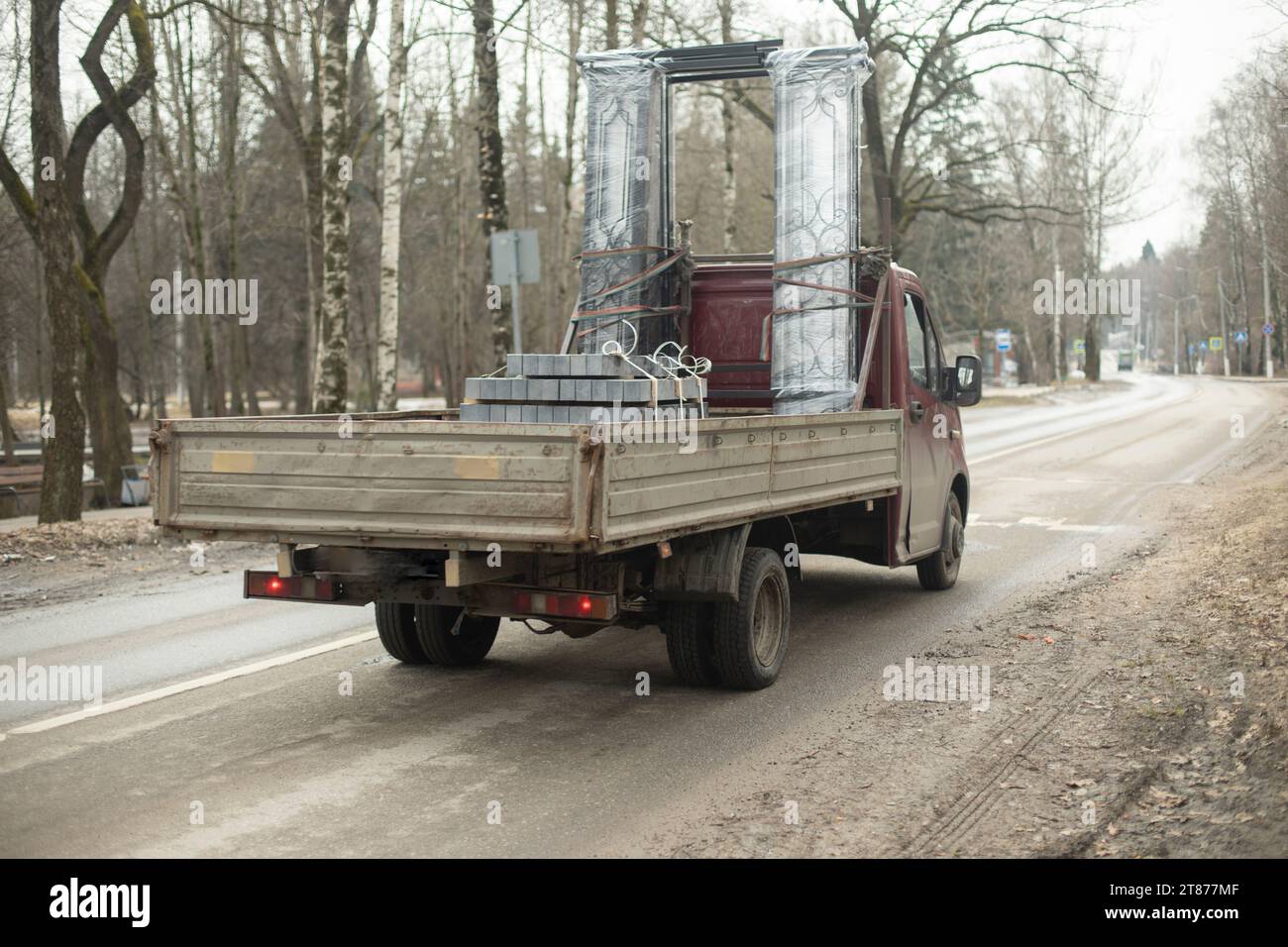 Truck in city. Cargo transport machine. Transport on road. Car with ...
