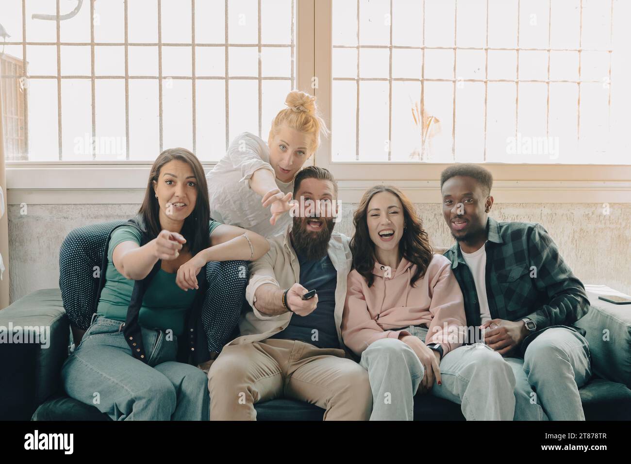 Party at home among young people. Multicultural group of kids having ...