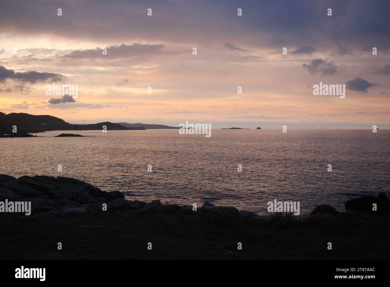 Sunset in Burela , Spain in the Cantabrian sea Stock Photo - Alamy