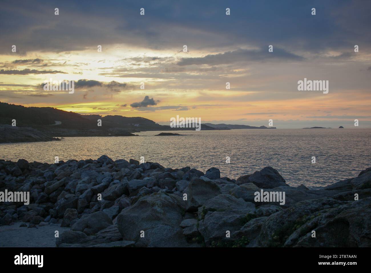 sunset lights in the Cantabrian sea in Burela, Spain Stock Photo - Alamy