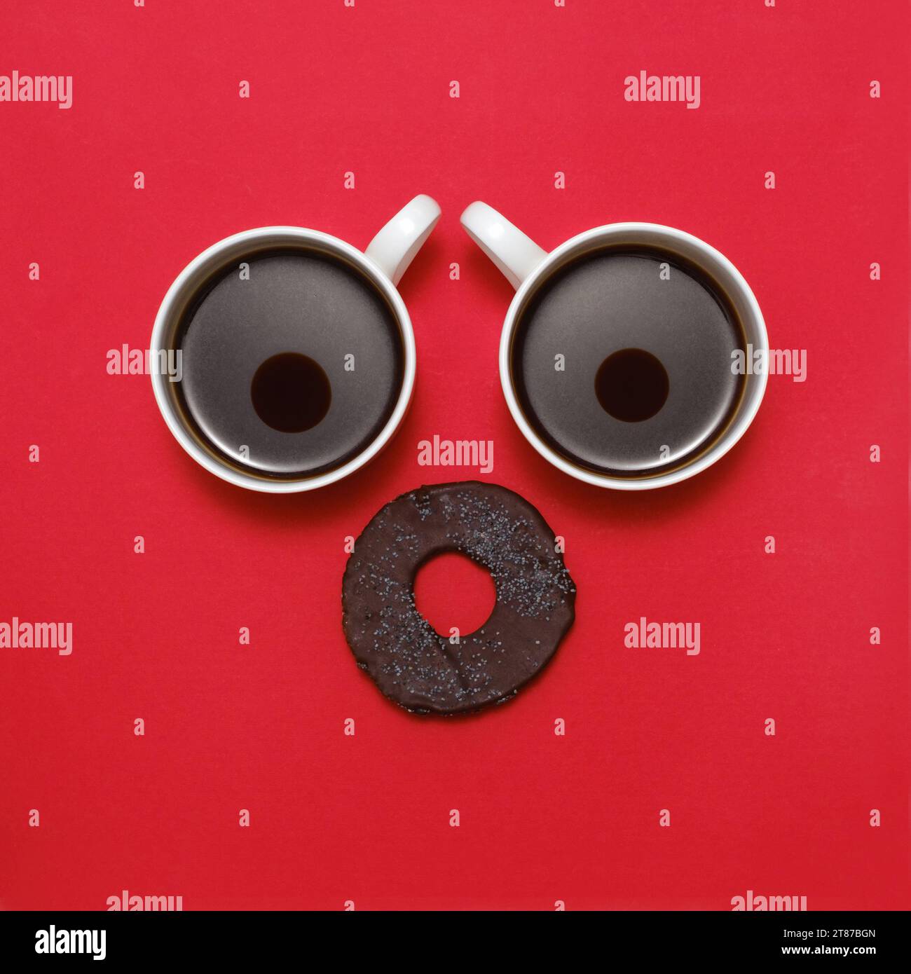 Coffee creative funny face. Smile from two cups of black espresso and ...