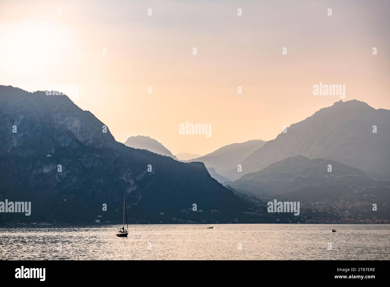 Lake Como Monte Crocione harbor and coastline at blue hour, Italy Stock ...