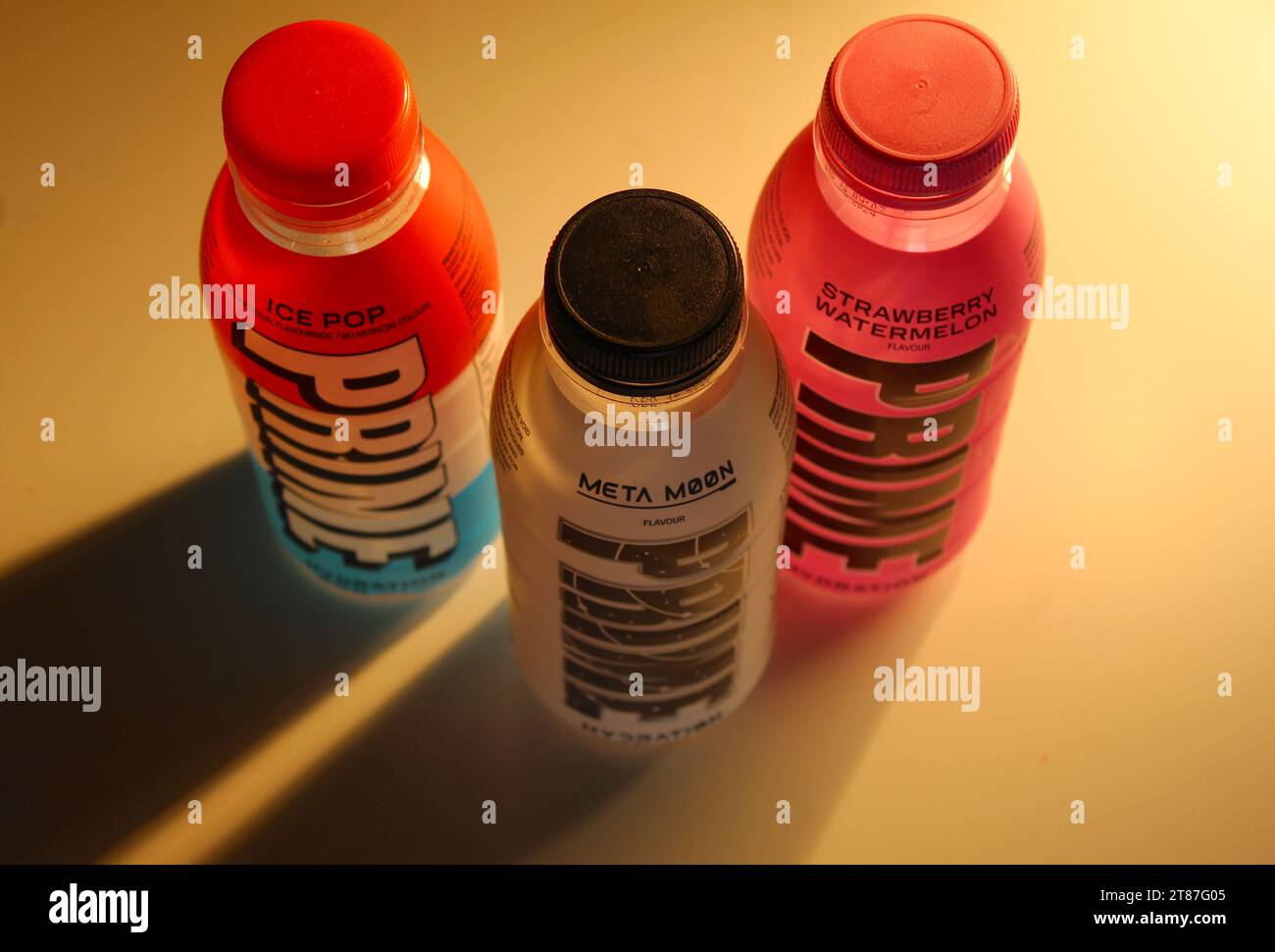 A high angle shot of multiple colourful bottles of the hydration ...