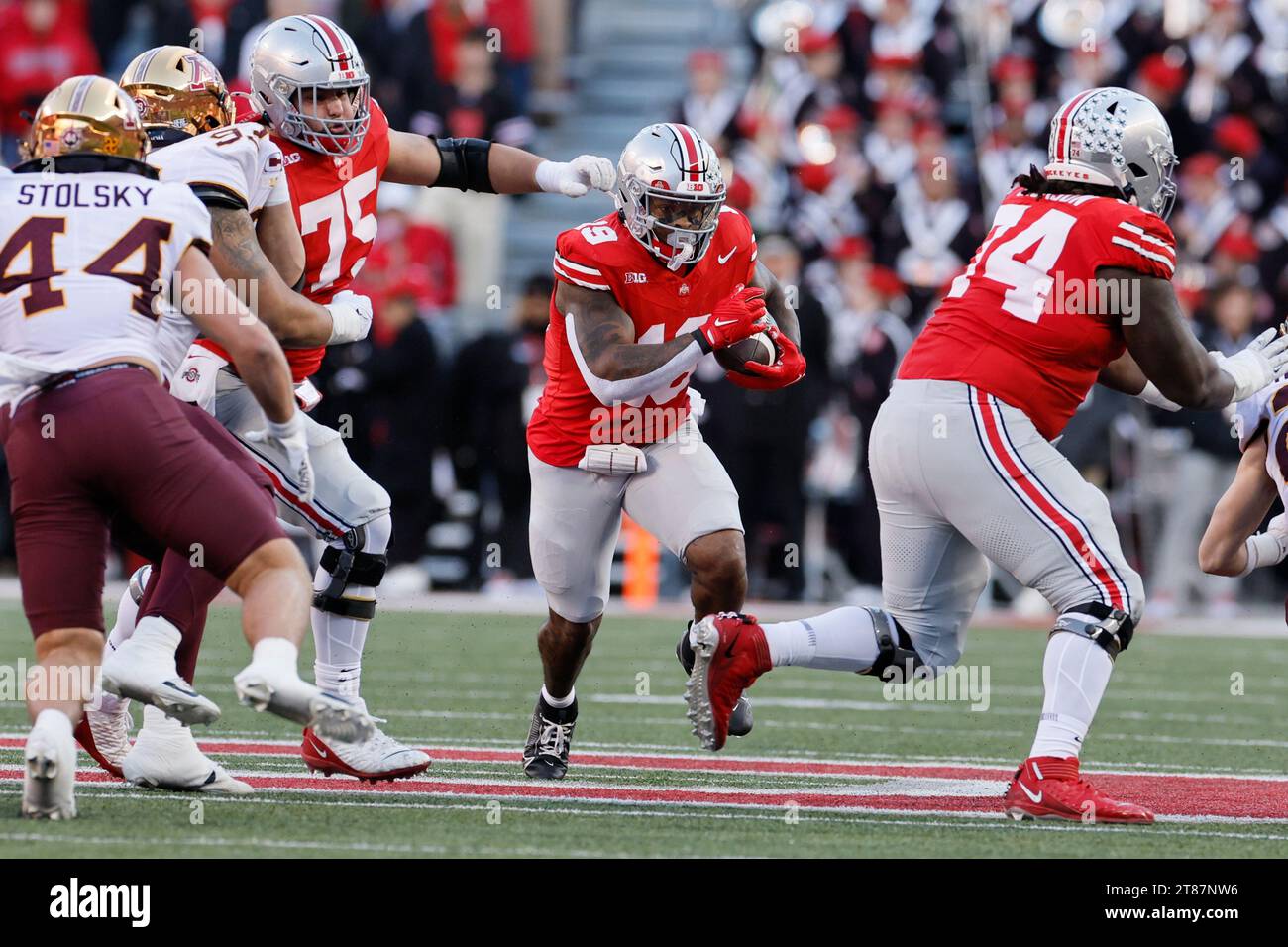 Ohio State running back Chip Trayanum, center, runs between blockers ...