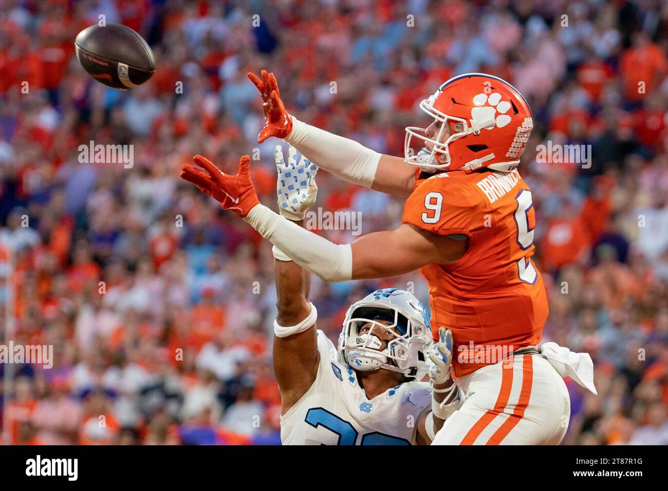 North Carolina linebacker Cedric Gray, bottom left, breaks up a pass ...