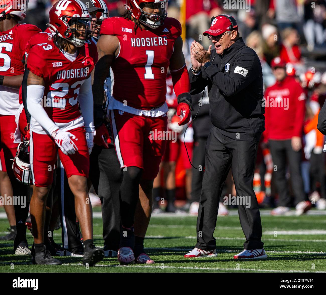 Indiana head coach Tom Allen fires up his players as they head onto the ...