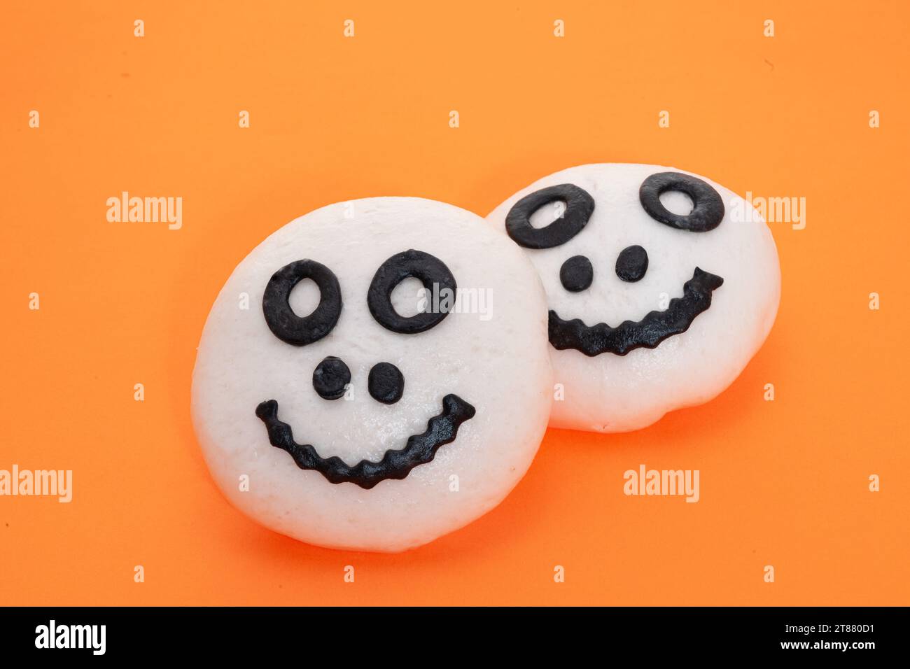 Halloween Asian Bao buns with scary faces in retail packaging - orange ...