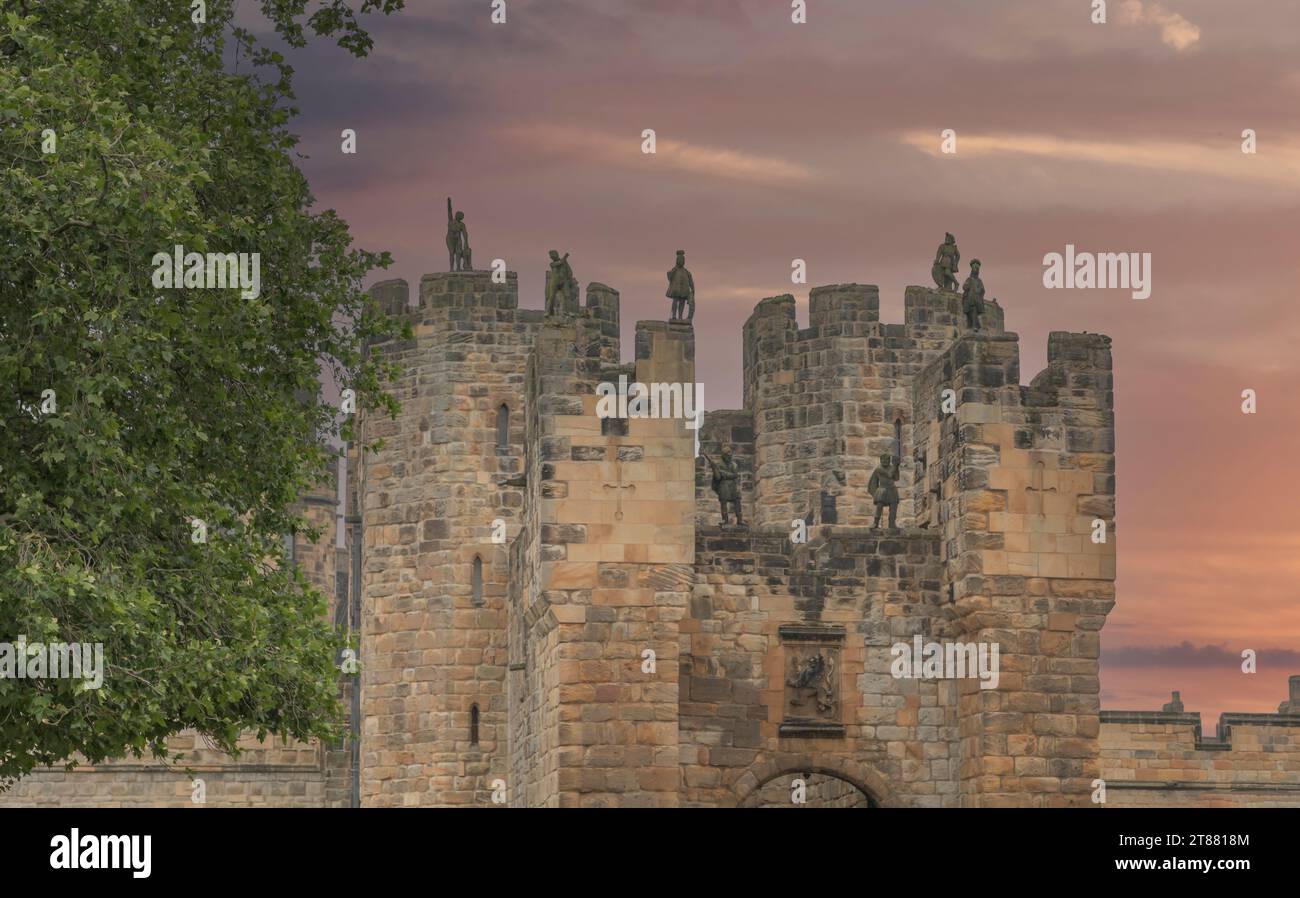 The ramparts of a ancient castle with statues on the top Stock Photo ...