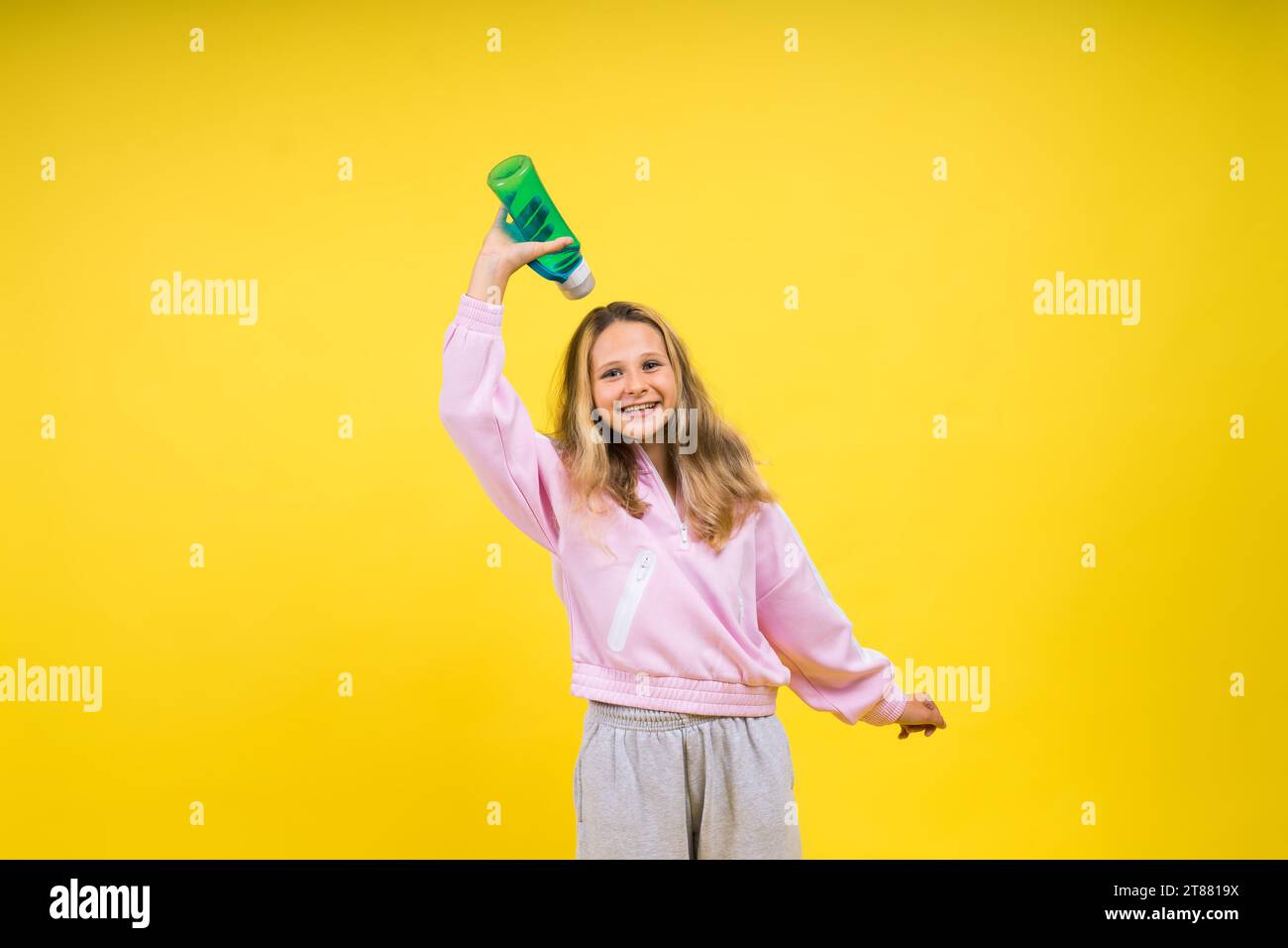 Female child feels thirsty, enjoy aqua for body refreshment. Healthy ...
