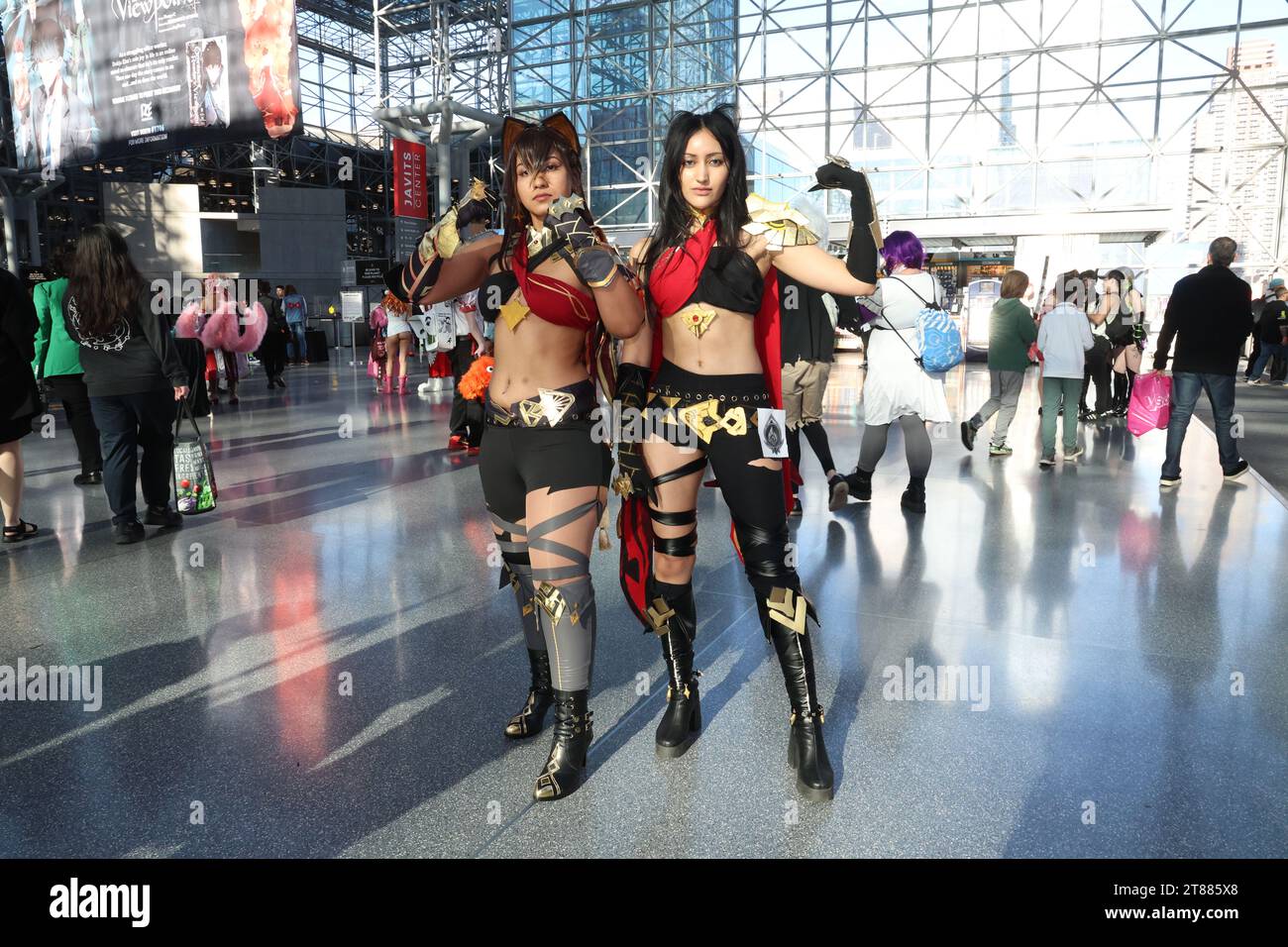 Cosplayer Joanna from New York and Green from Philadelphia are dressed as Dehya and Dio from ...