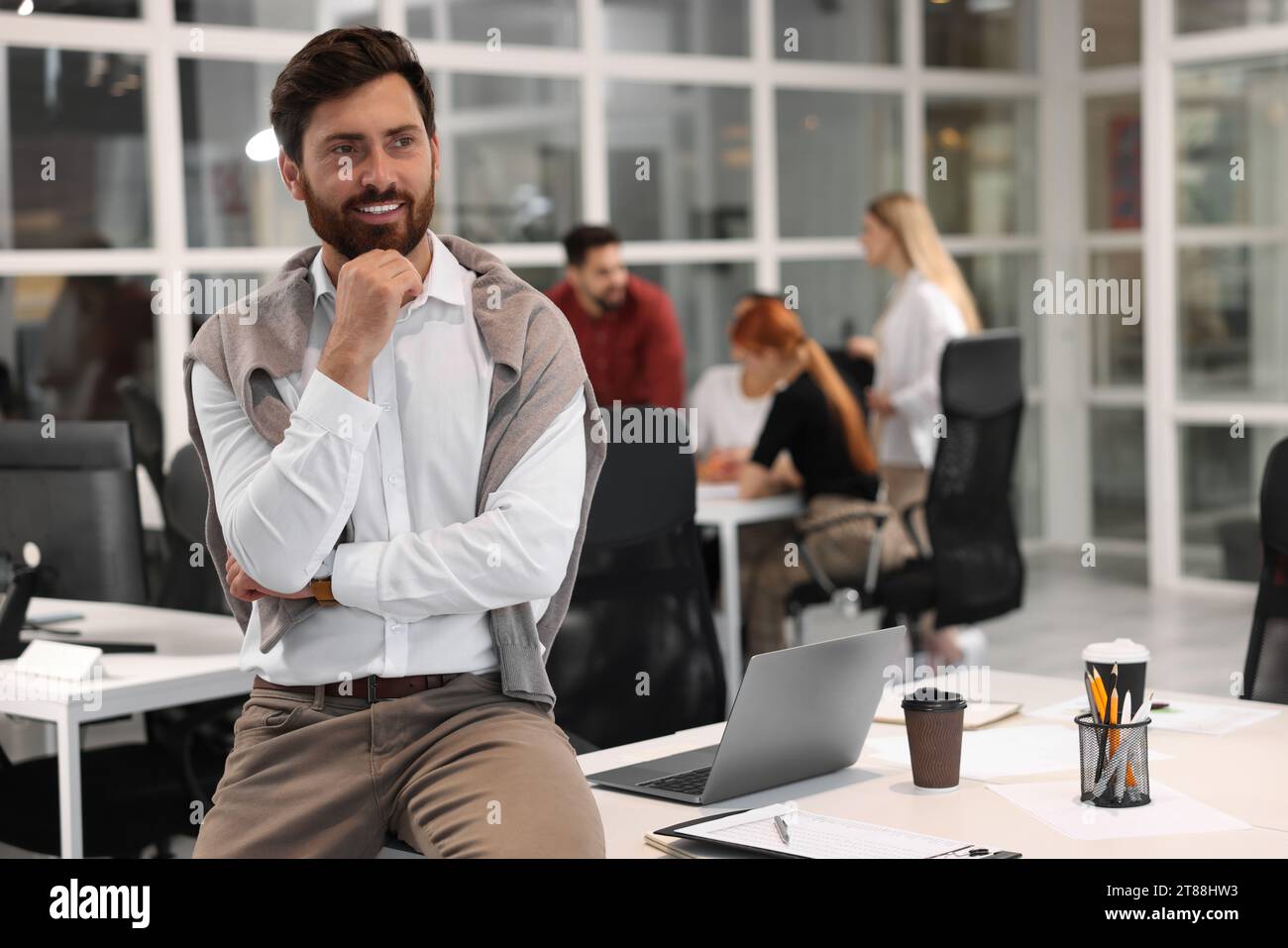 Team of employees working together in office. Happy man indoors Stock ...
