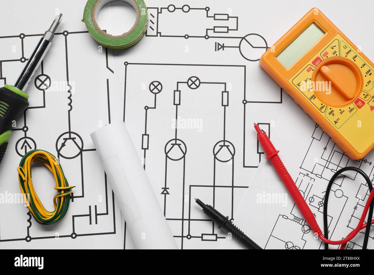 Digital multimeter and tools on wiring diagrams, top view Stock Photo ...