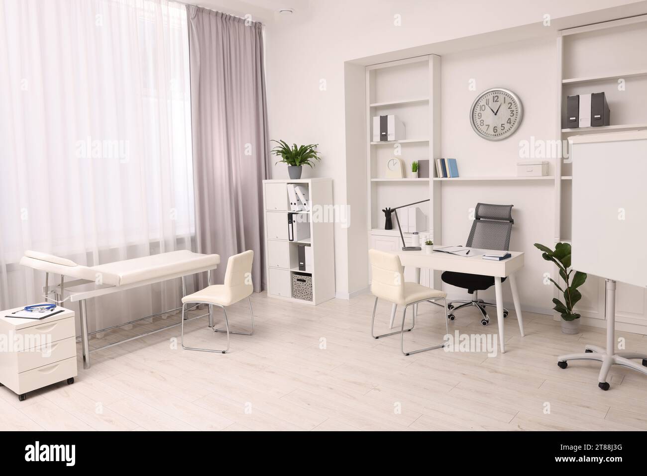 Modern medical office interior with doctor's workplace and examination ...