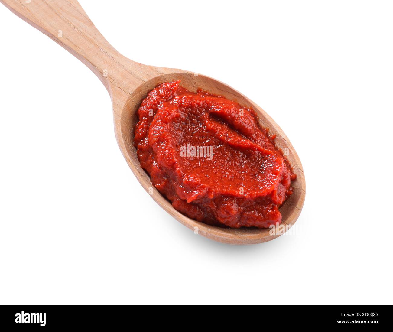 Wooden spoon of tasty tomato paste isolated on white Stock Photo - Alamy