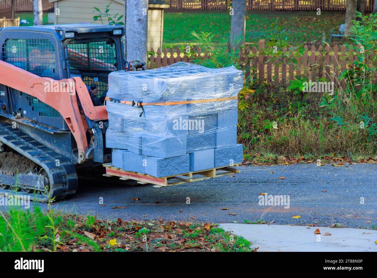 Worker unloads concrete blocks hi-res stock photography and images - Alamy
