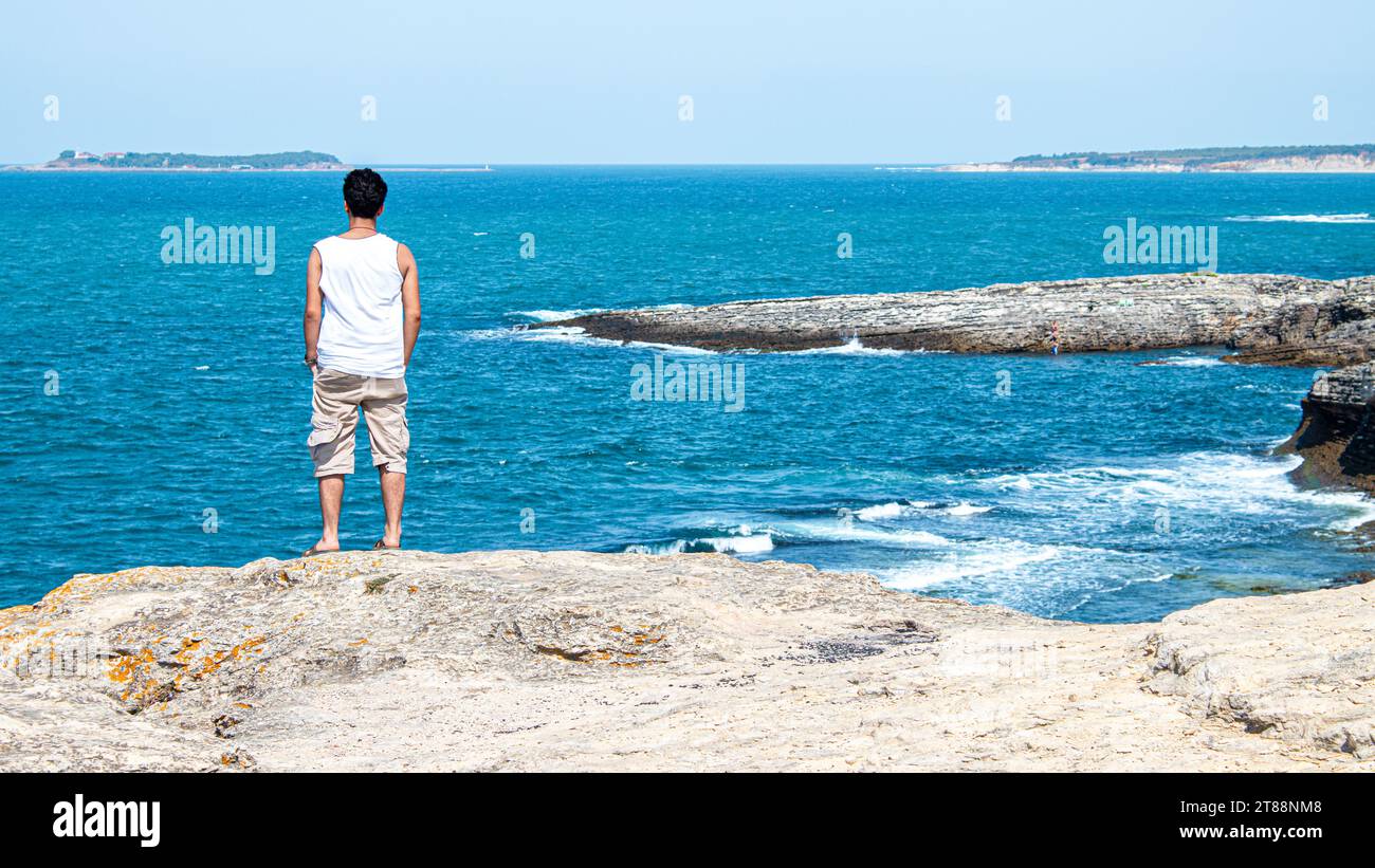 Dramatic background. A man with his back turned to the infinity of the ...