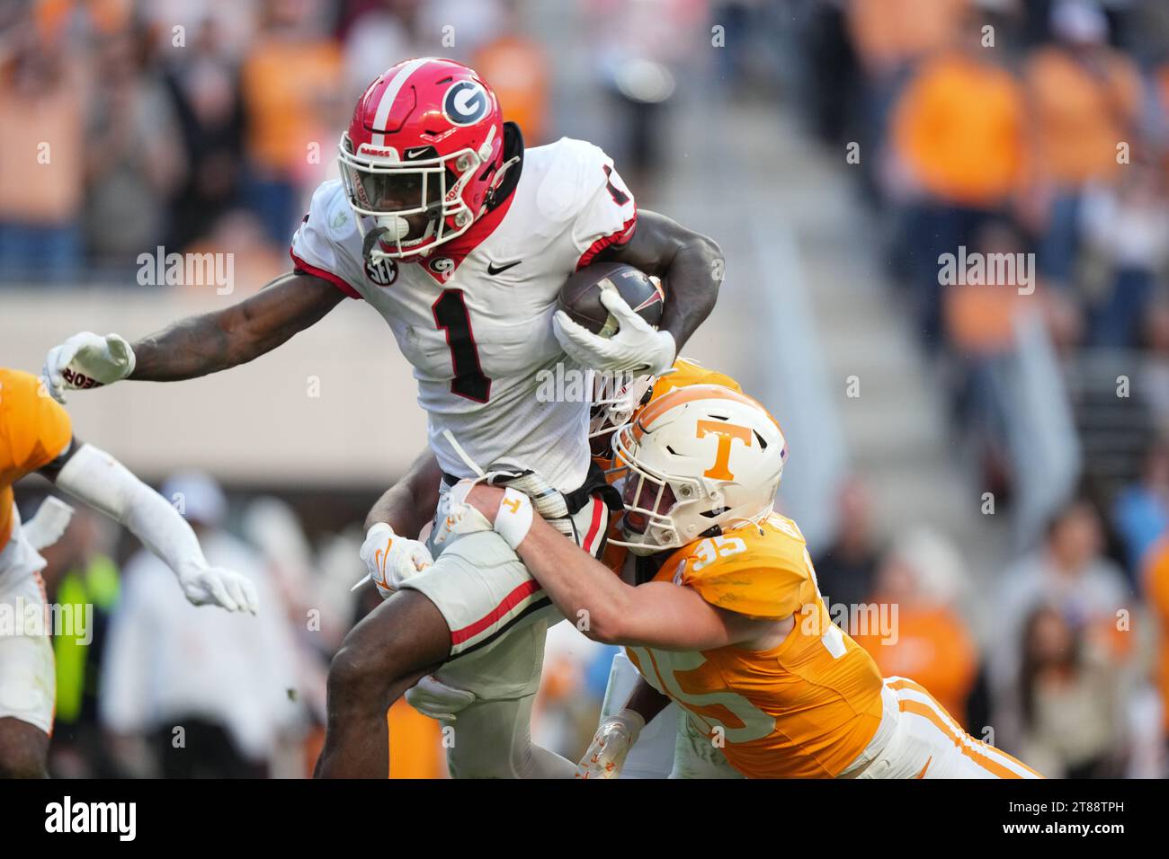 November 18, 2023: Marcus Rosemy-Jacksaint #1 of the Georgia Bulldogs runs the ball after a ...