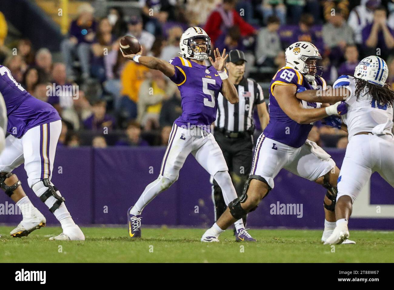 November 18, 2023: LSU quarterback Jayden Daniels (5) connects on a 70 ...