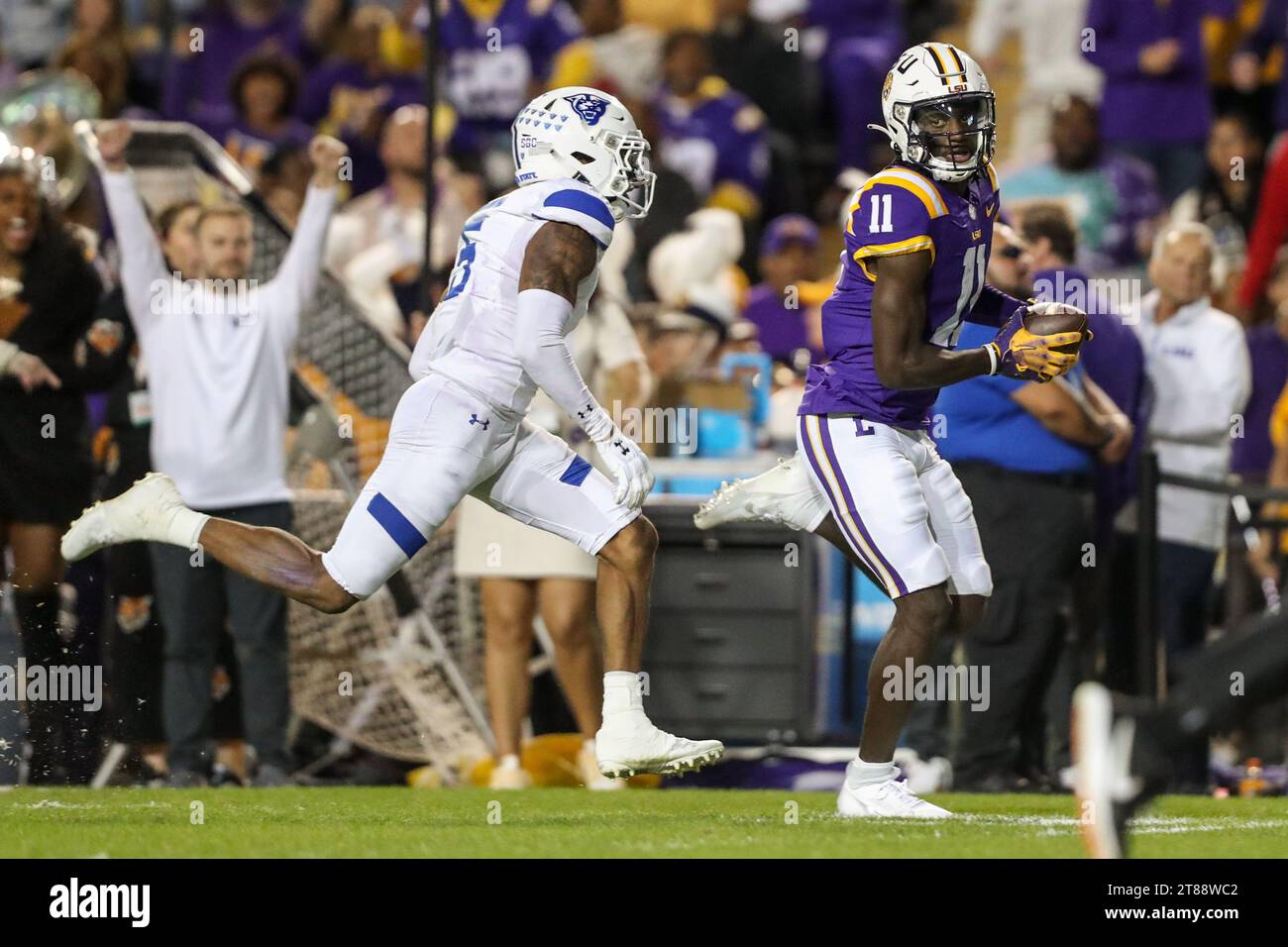 November 18, 2023: LSU wide receiver Brian Thomas Jr. (11) runs past ...