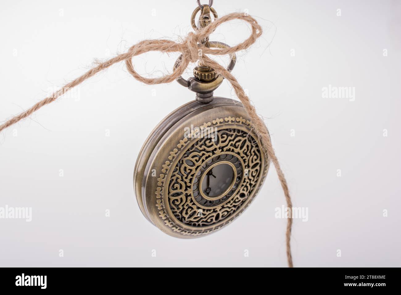 Retro style pocket watch on white background Stock Photo - Alamy
