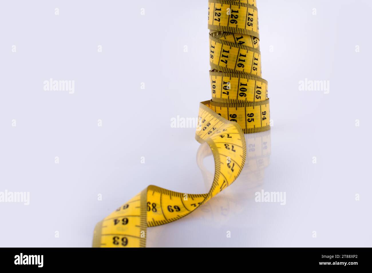 Tape measuring white background hi-res stock photography and images - Alamy